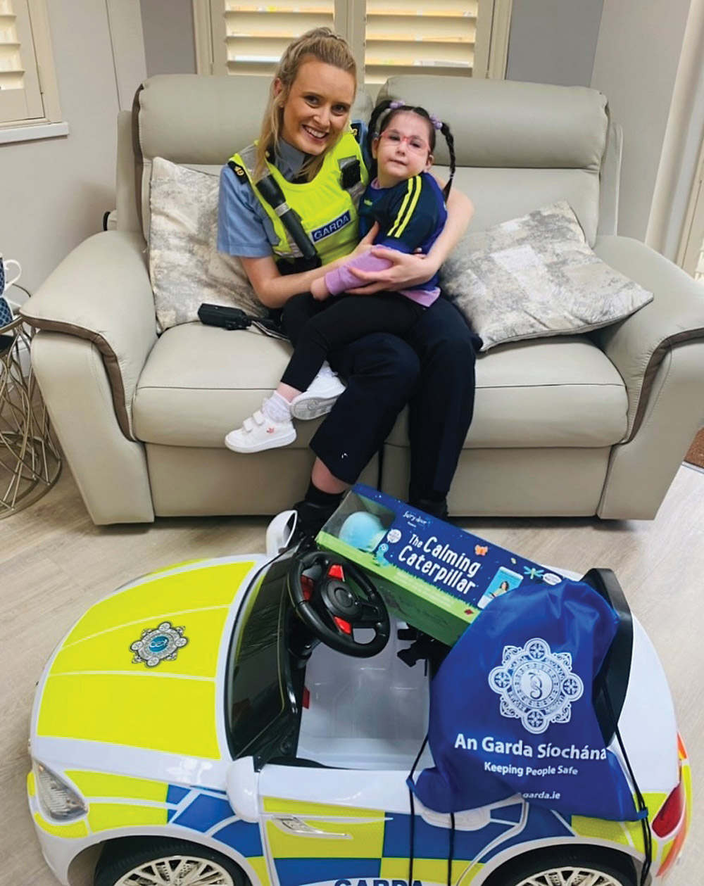 Brave young Evie (3) delighted with her honorary garda status | Echo.ie